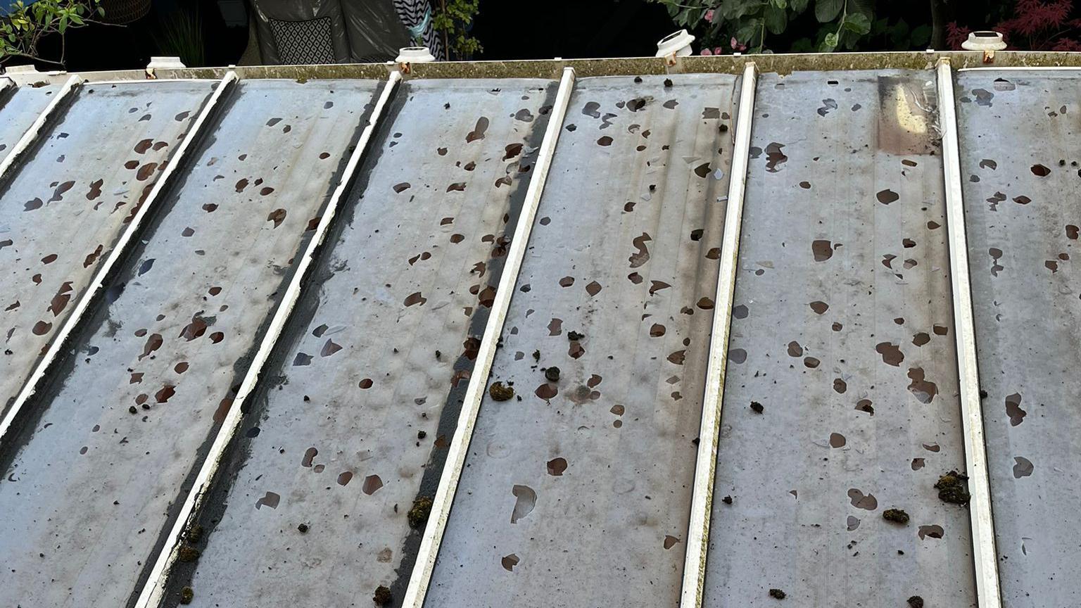 Giant hail stones damage conservatory roofs and cars in Melksham - BBC News