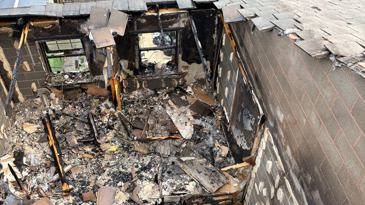 Photos reveal extent of Derby fire from e-scooter battery - BBC News