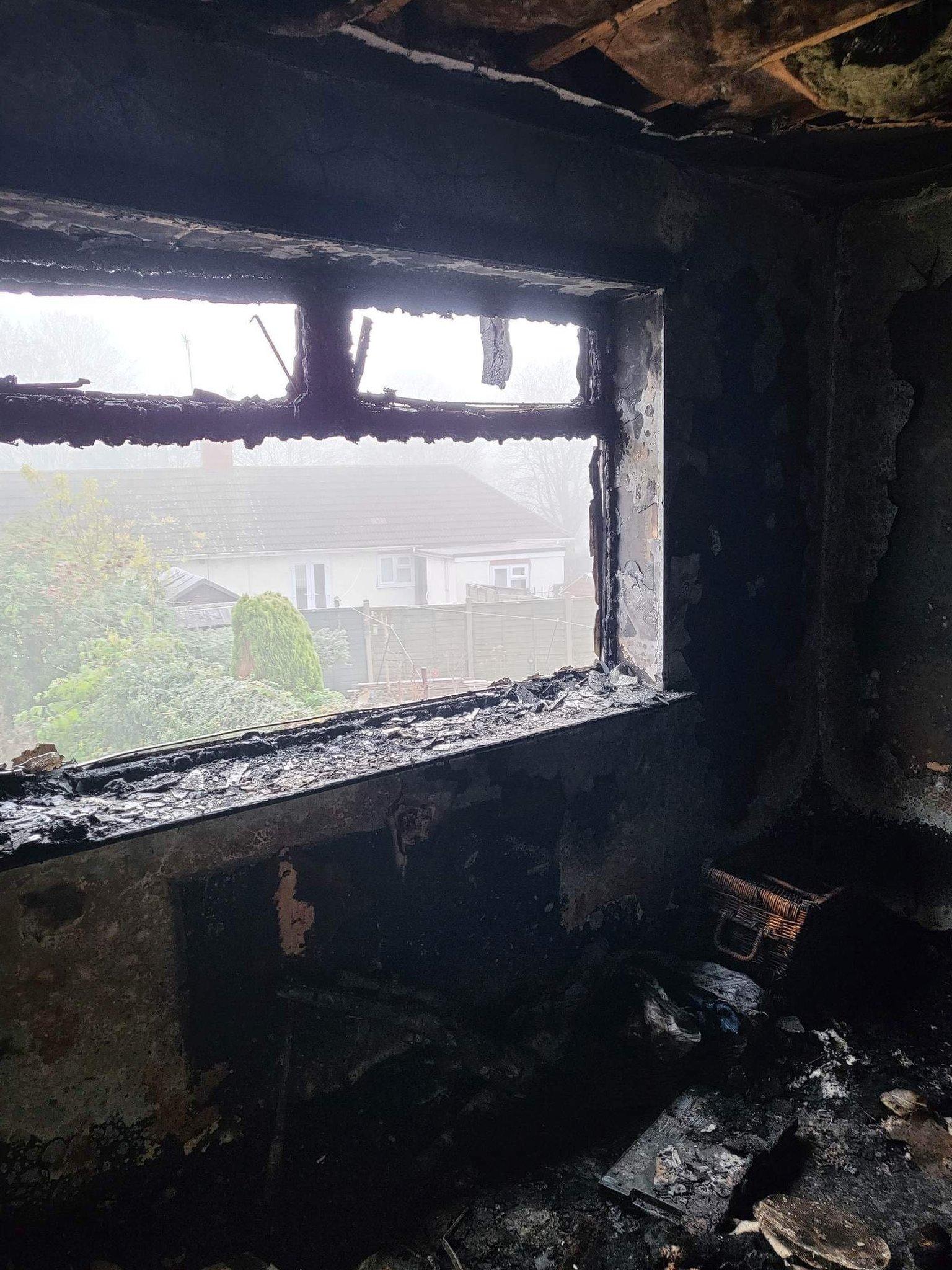 Sutterton fire: Charger warning as blaze rips through home - BBC News