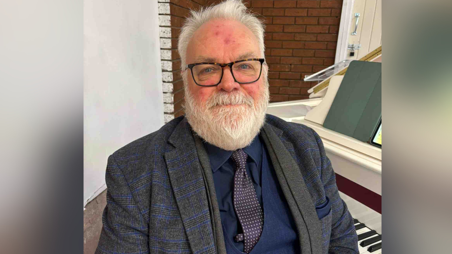 Wigan pianist offers free lessons to people who can't afford them - BBC ...