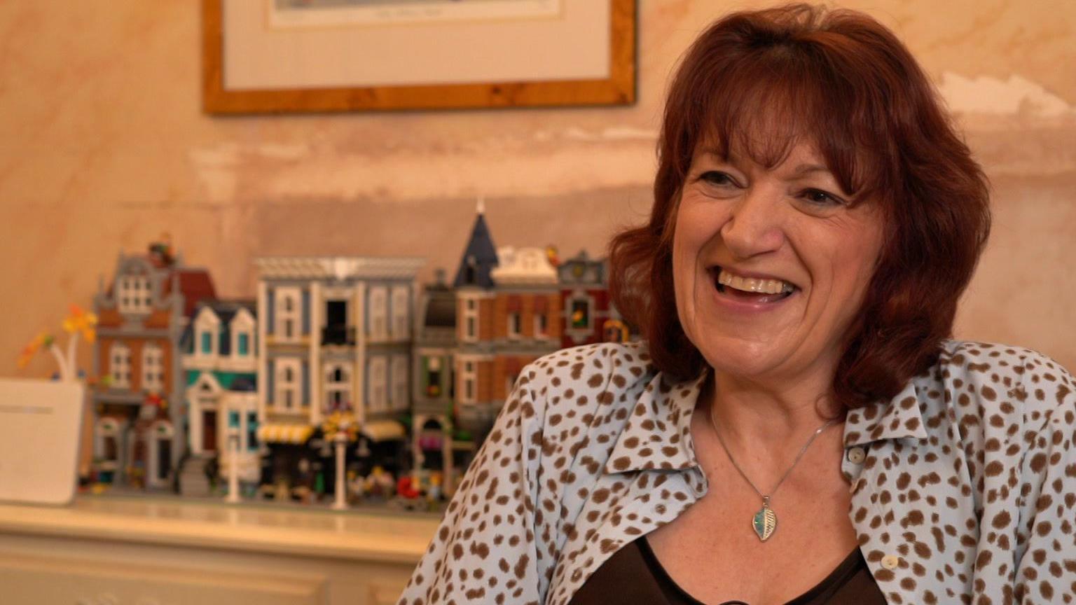 Solihull maths lecturer retains Scrabble title after UK Open win - BBC News