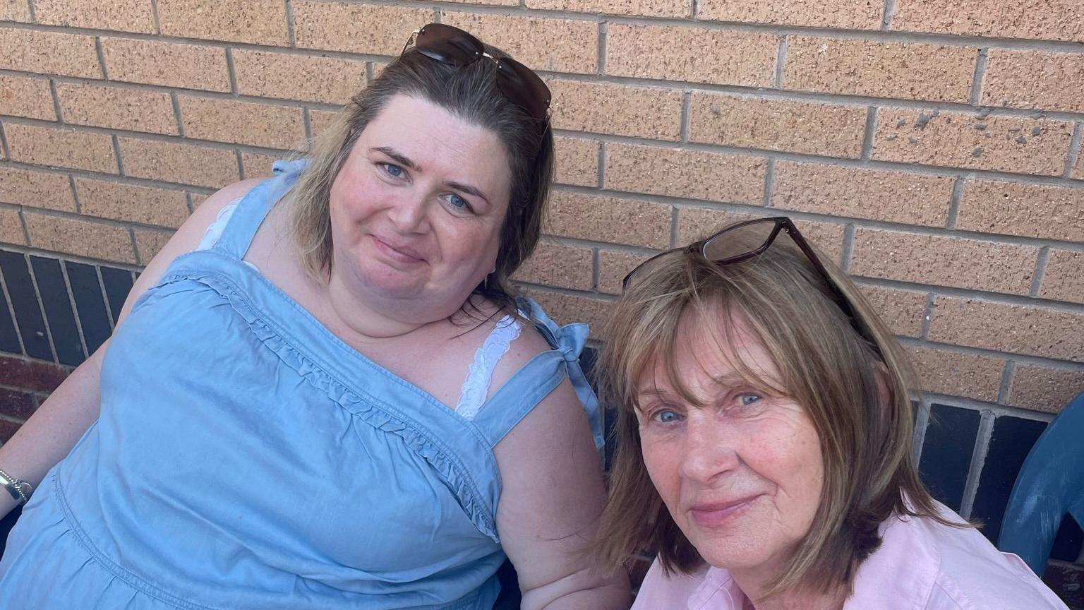 Disabled woman left to sit outside flat for hours during flooding - BBC ...