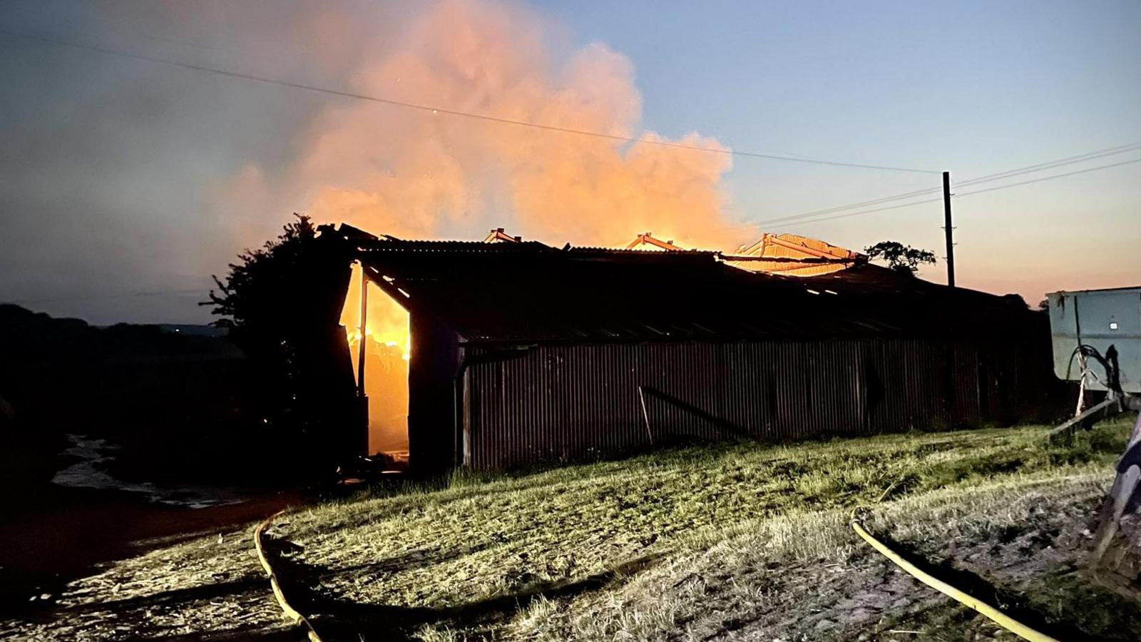 Barn fire in Shropshire destroys 70 tonnes of hay - BBC News