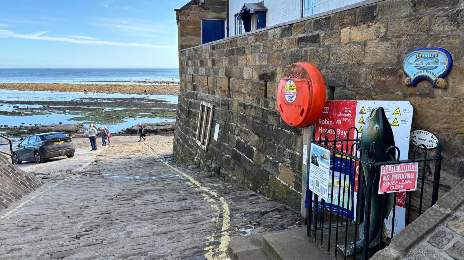 Robin Hood's Bay cod has raised fund for RNLI since the 1800s - BBC News