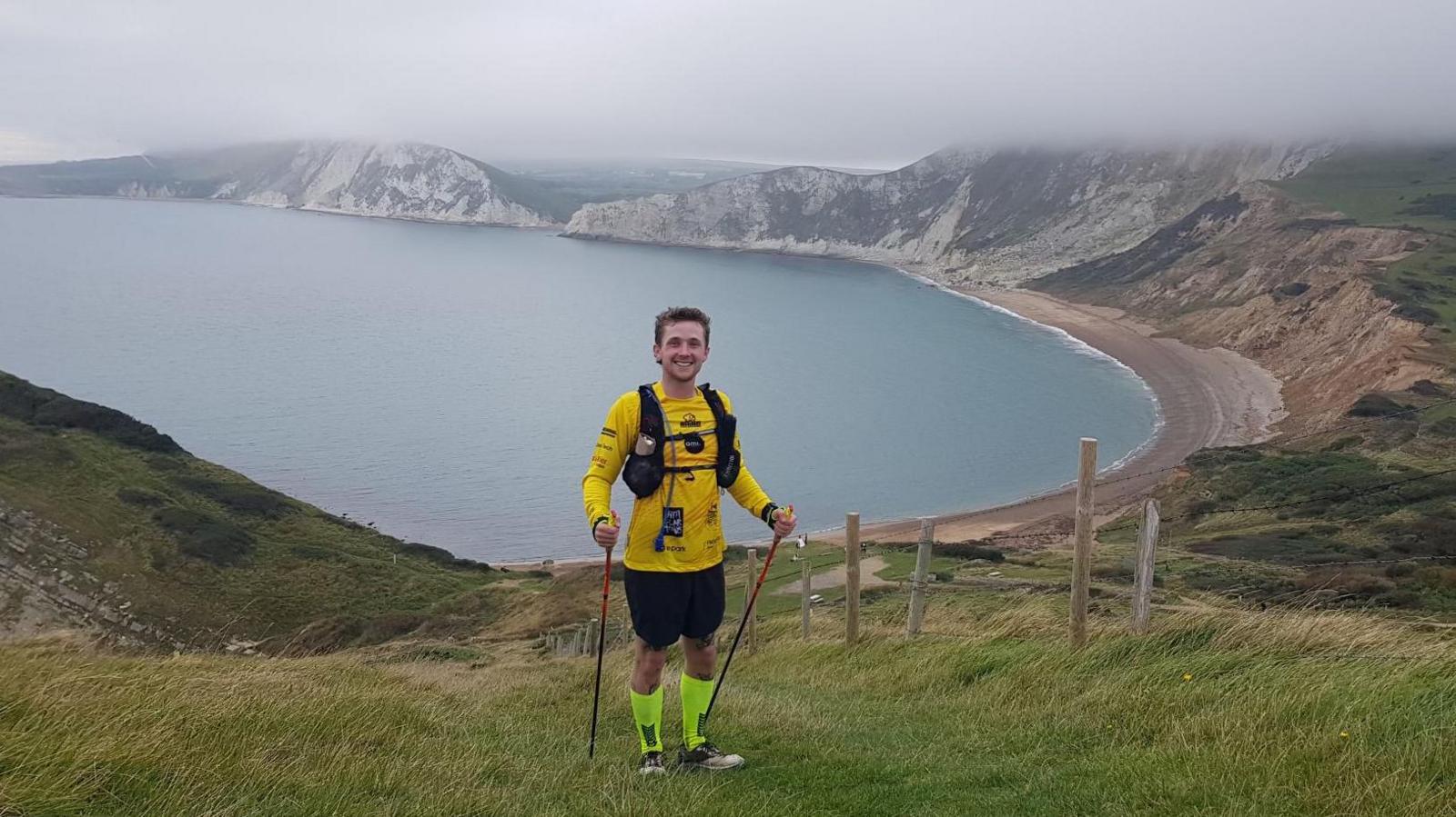 Cheddar: Marathon runner raises £15k on South West Coast Path - BBC News