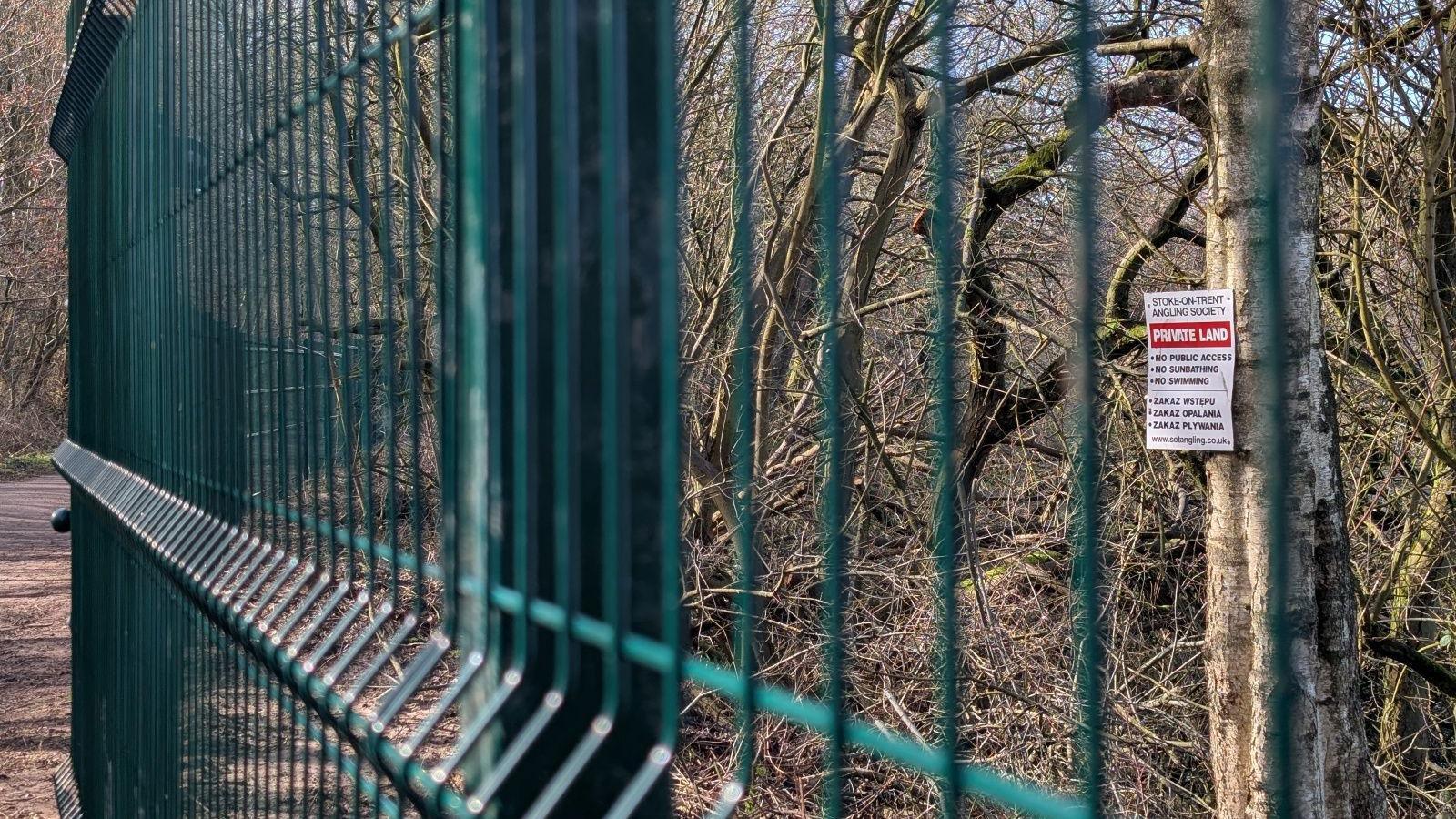 Anger as 'prison' fence erected at Astbury Mere Country Park - BBC News