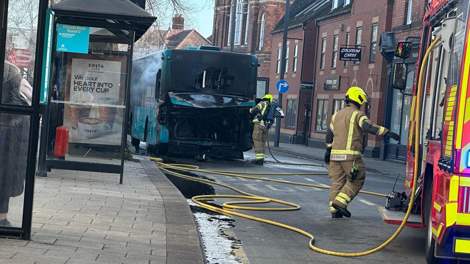 Bus 'well alight' in Tamworth as crews arrive to tackle flames - BBC News