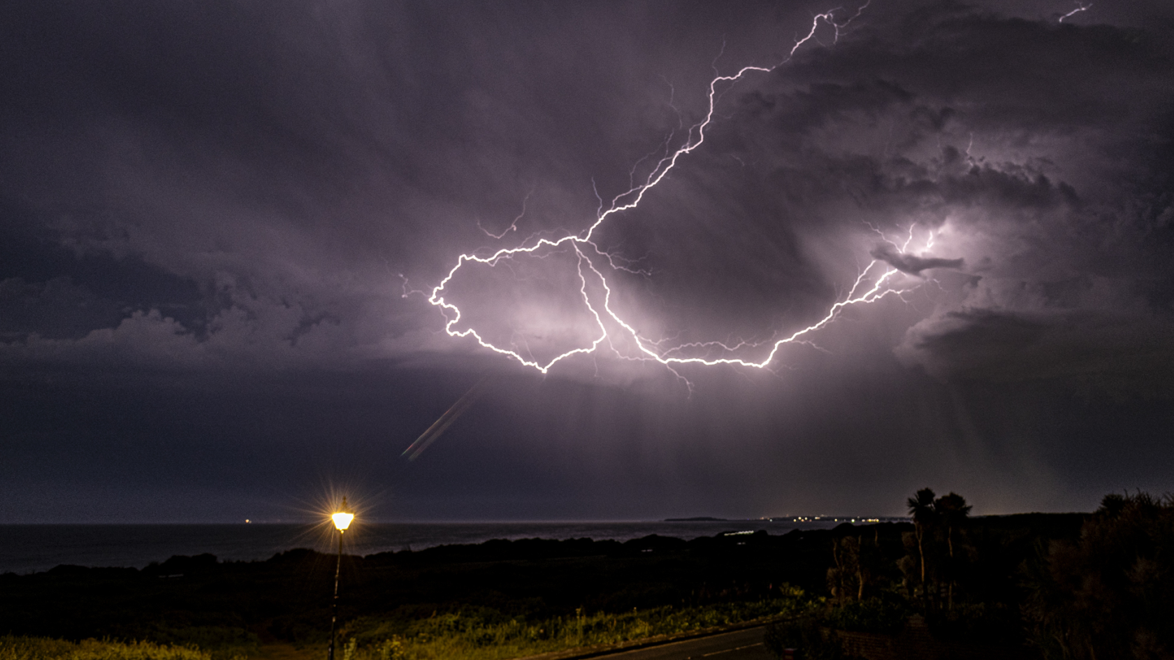 In Pictures: Lightning strikes captured over south's skies - BBC News