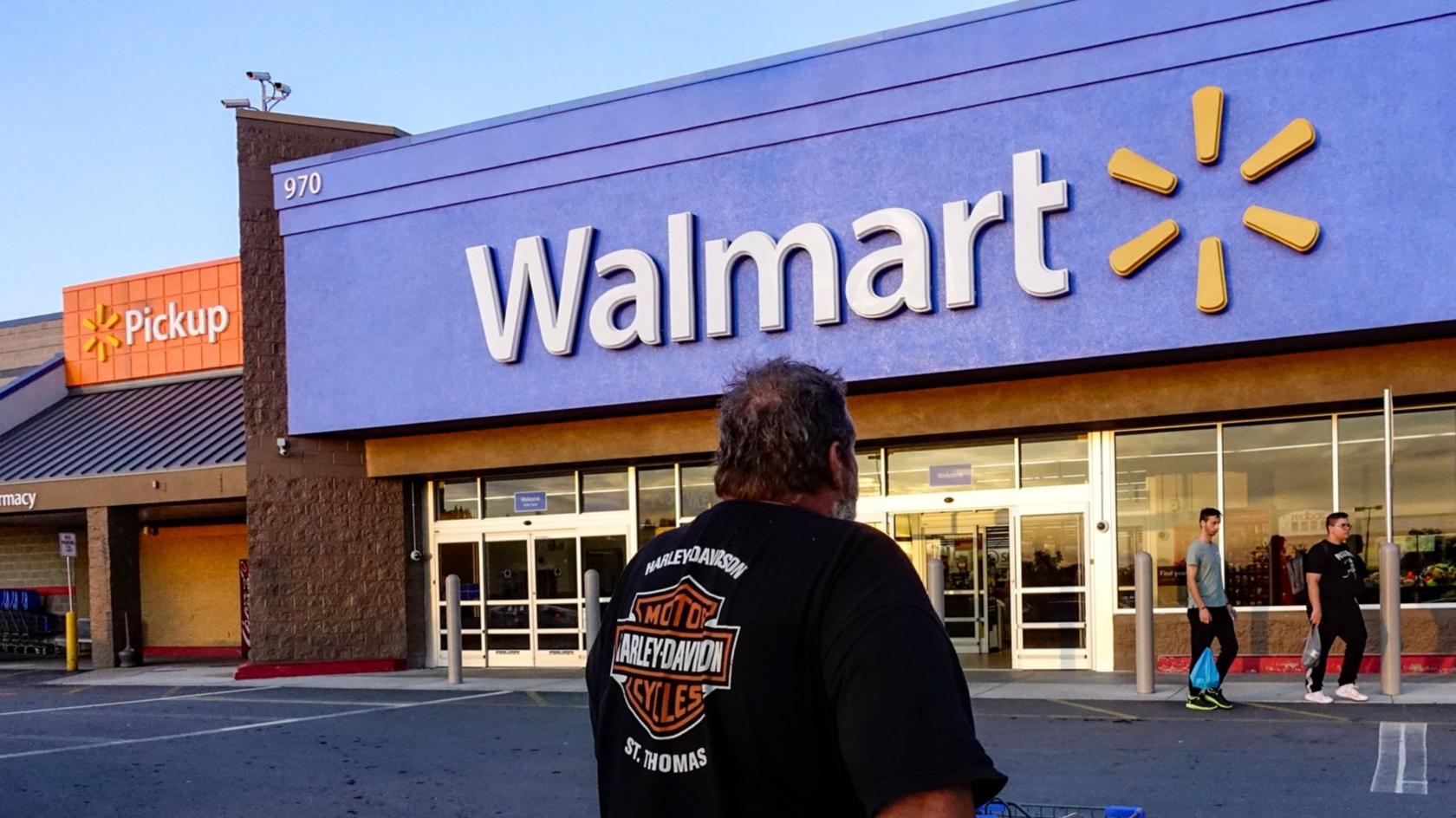 Walmart becomes first retailer to hit $1tn market value - BBC News