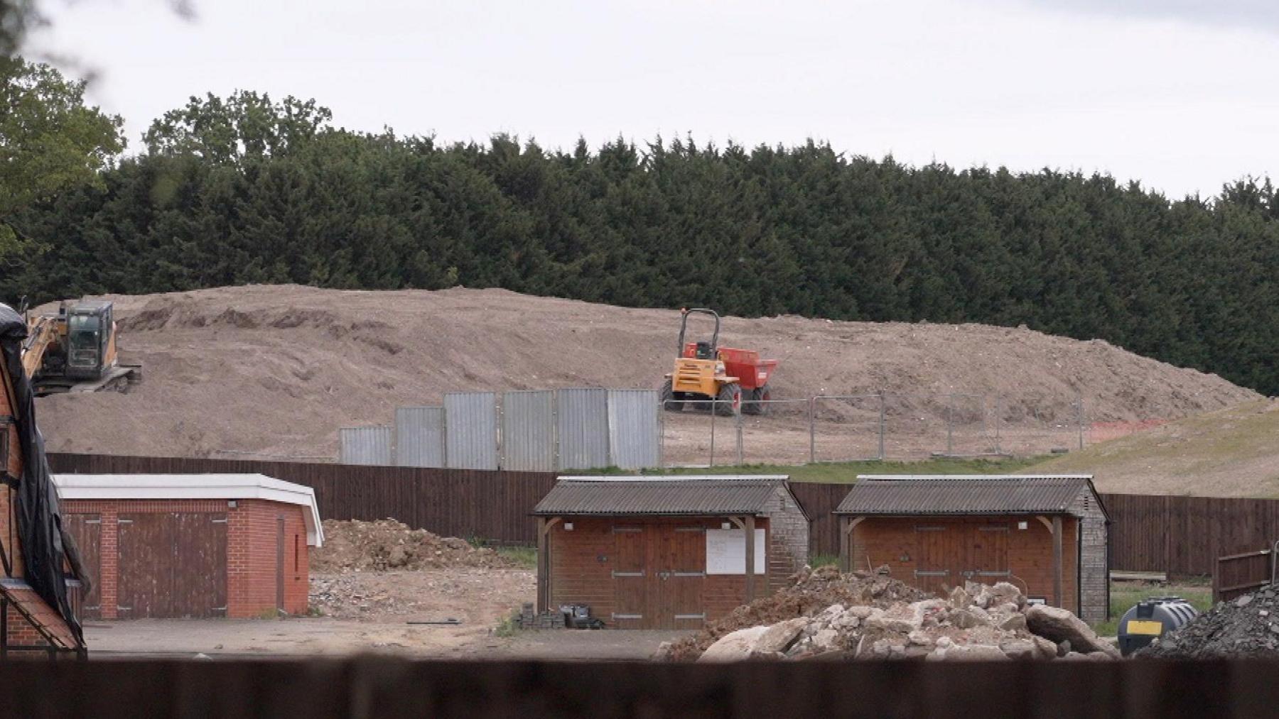 Criminal probe into '32,000 tonne waste dump' at Binfield farm - BBC News