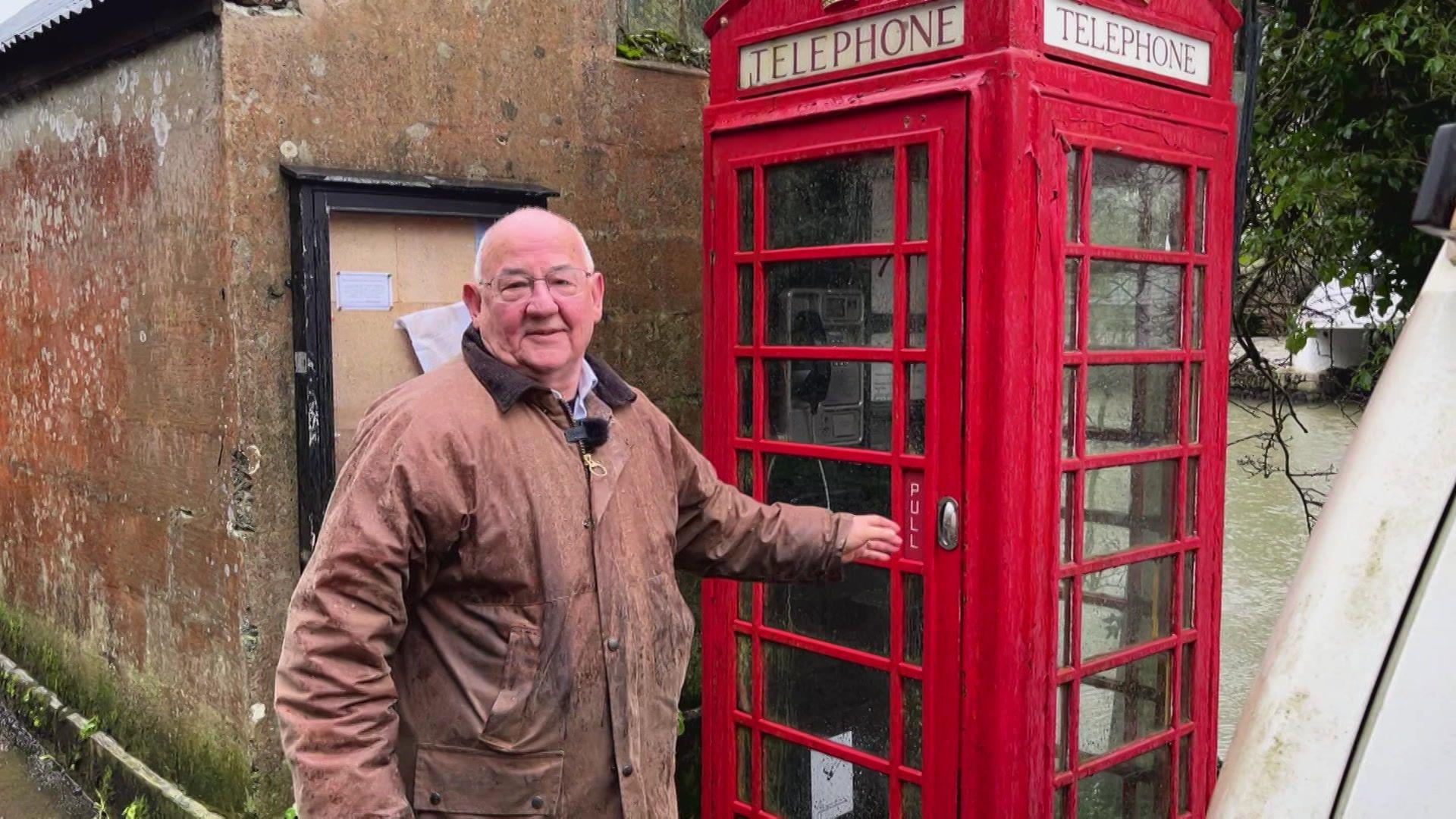 BT phone box offers lifeline for Helford villagers after storm - BBC News