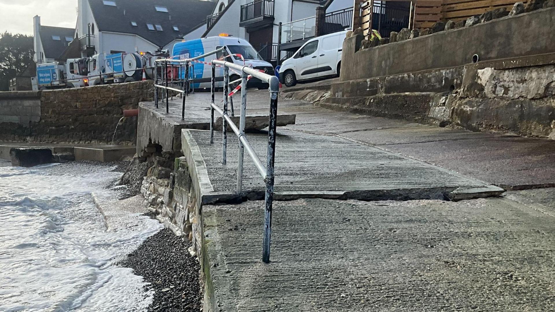 Slipway on Isle of Wight closed after large cracks found - BBC News