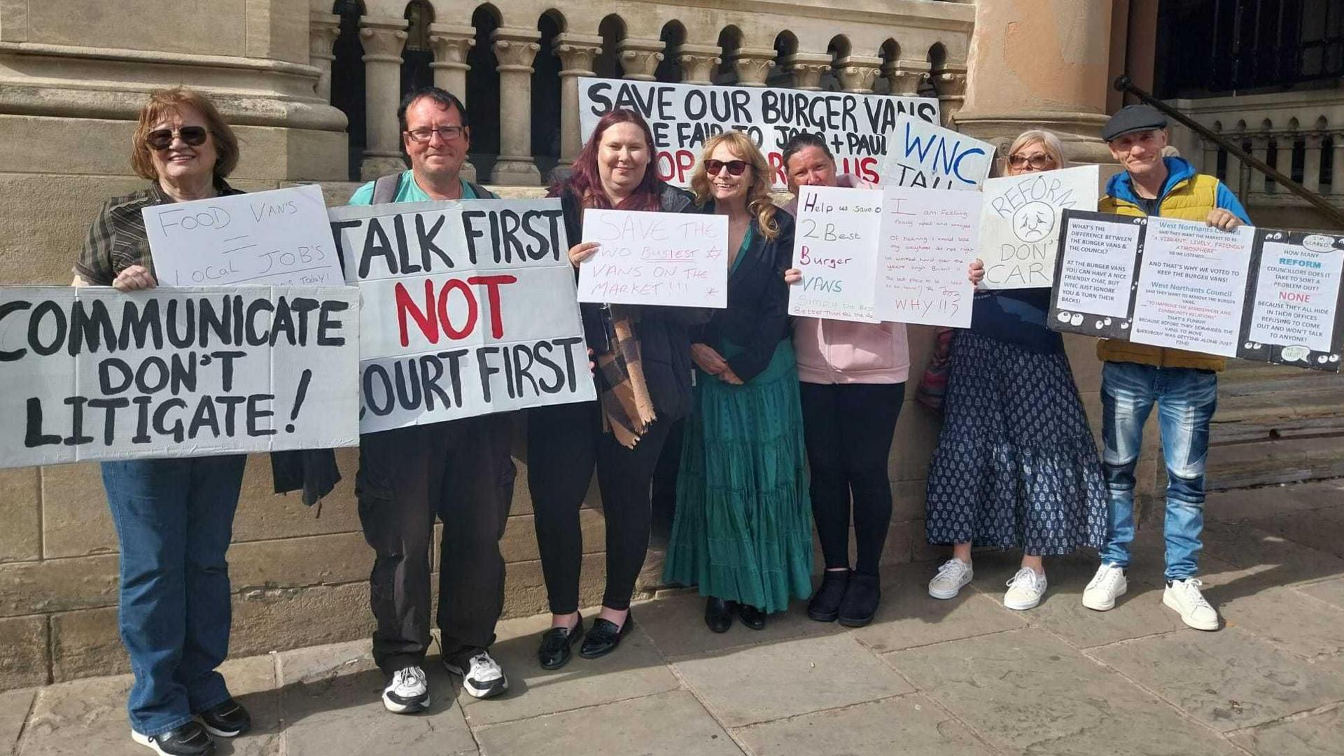 Northampton protesters defend market food vans in council dispute - BBC ...
