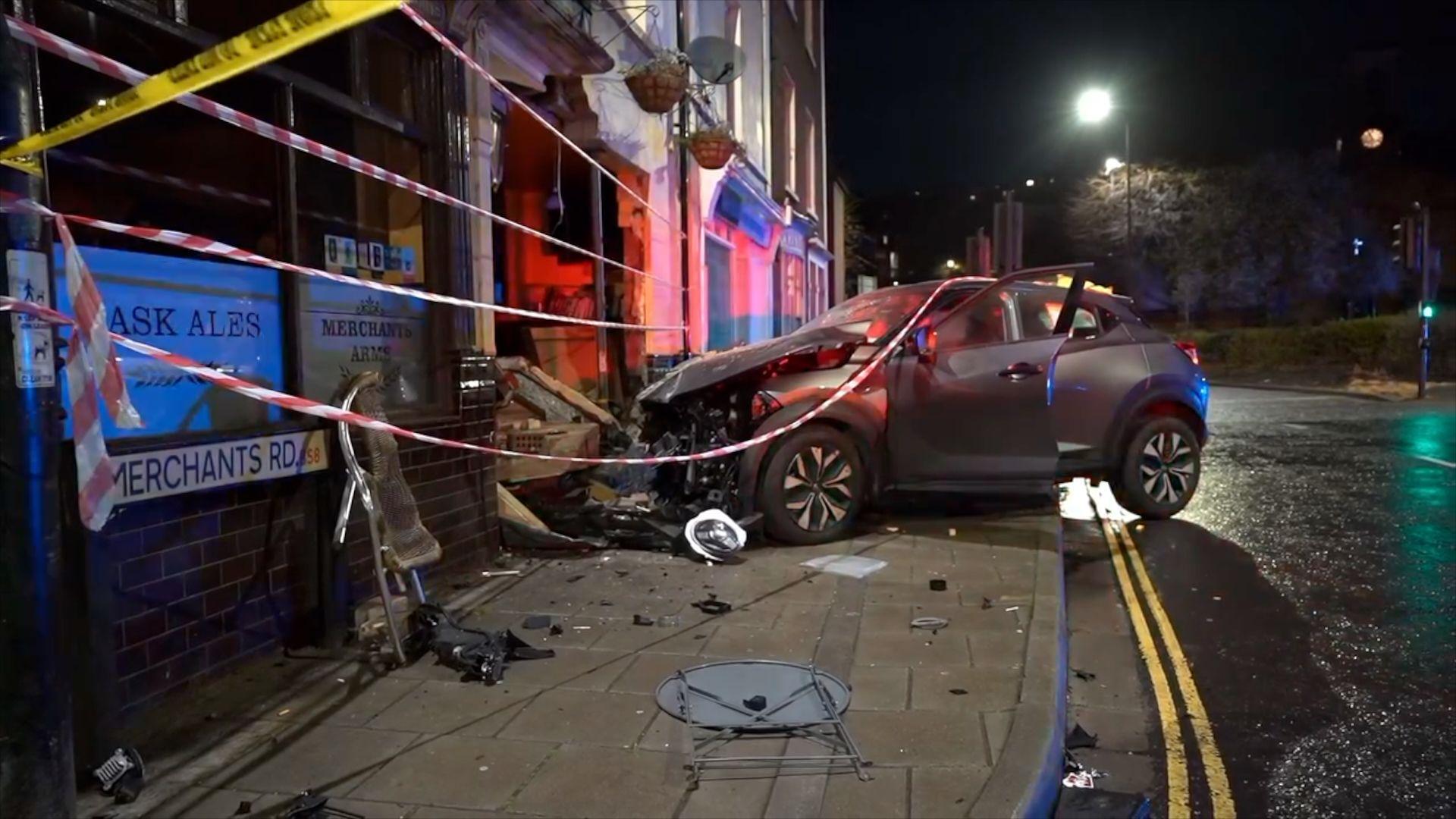 Arrest after five injured as car crashes into Merchants Arms pub - BBC News