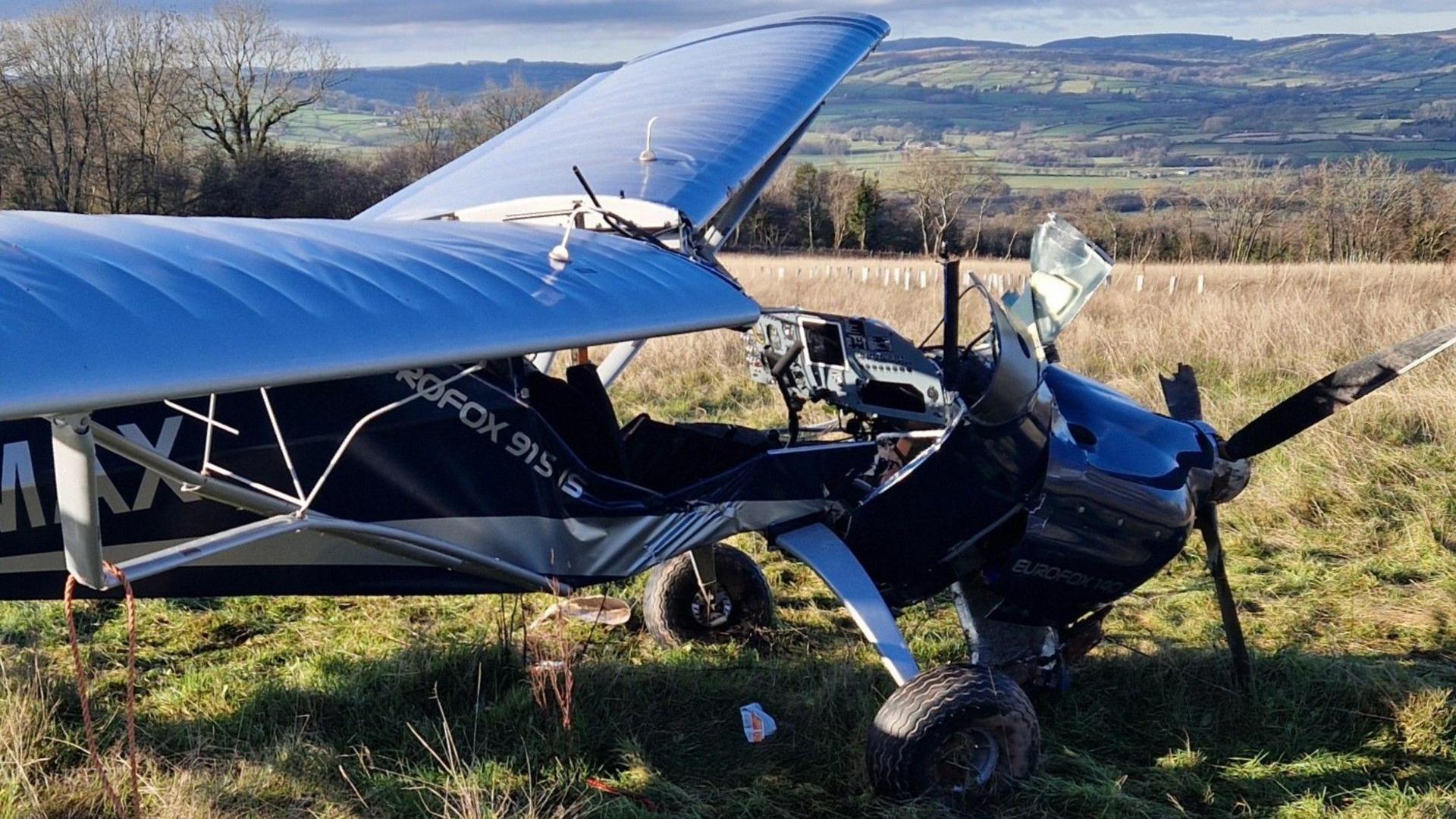 Plane crashes in Talgarth field with pilot taken to hospital - BBC News