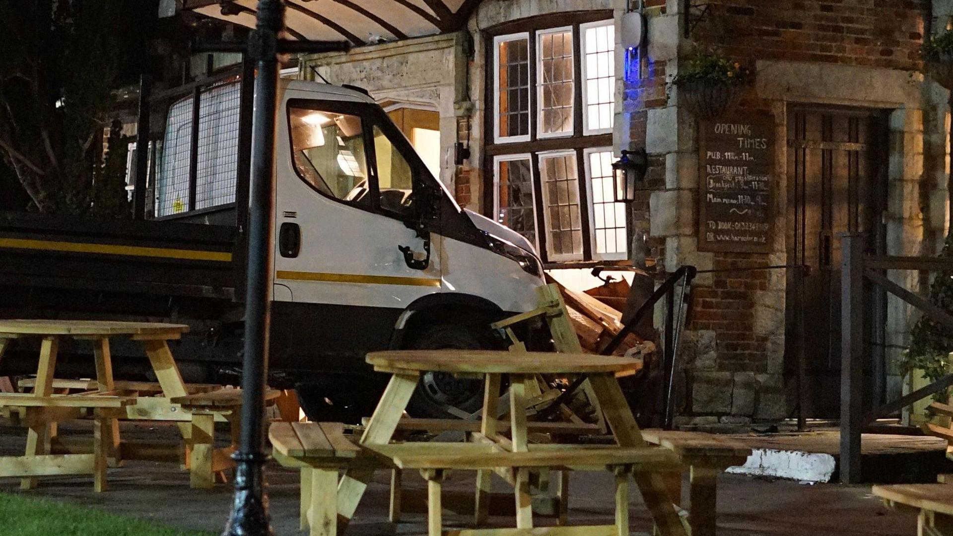 Man arrested after van crashes into pub in Polegate - BBC News