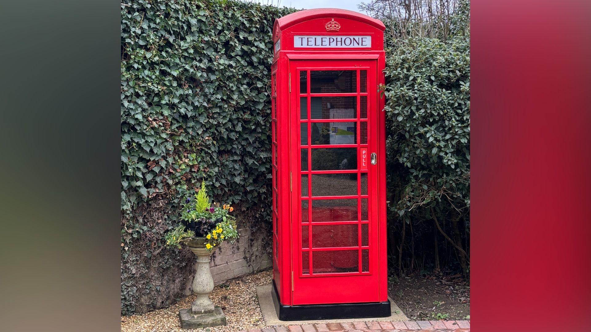 Owner's appeal for photos from phone box's Little Eversden past - BBC News