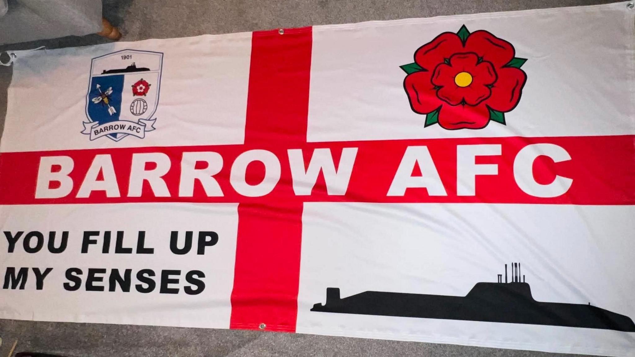 Fifa bans Barrow football club's submarine badge on flag - BBC News