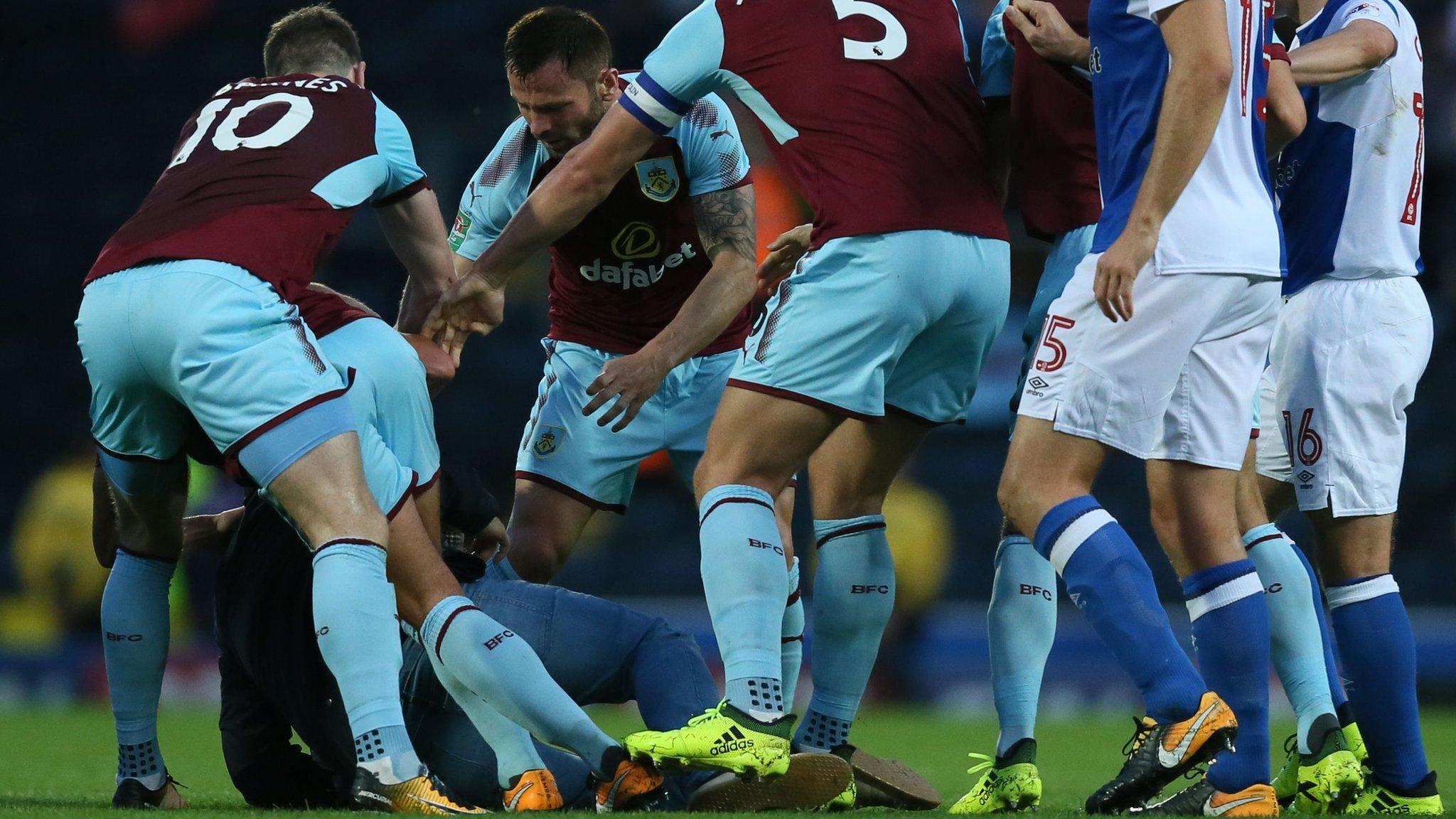 Fan banned for three years for Burnley footballer attack - BBC News