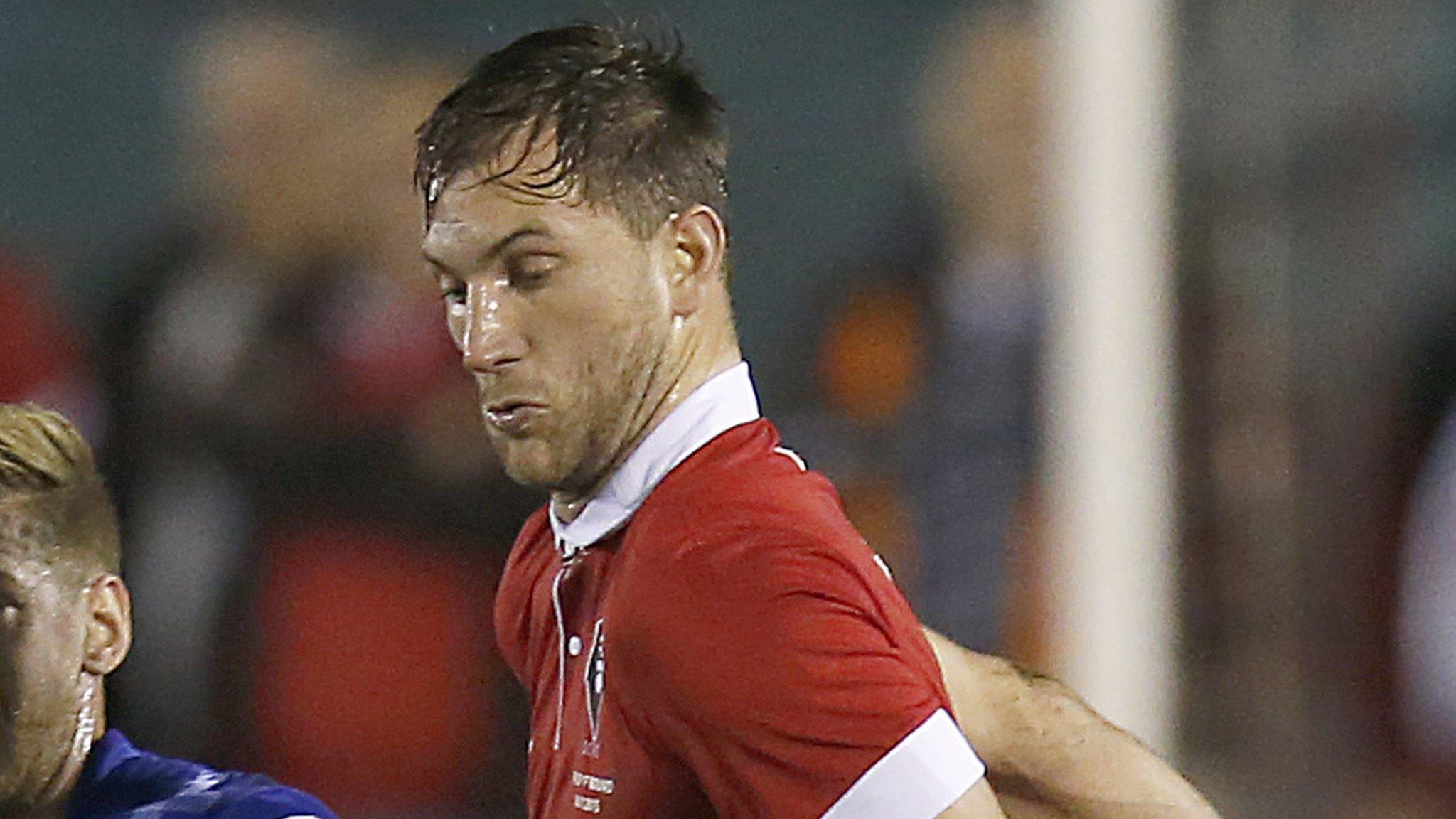 Bury fan who slapped Grimsby striker banned for three years - BBC News