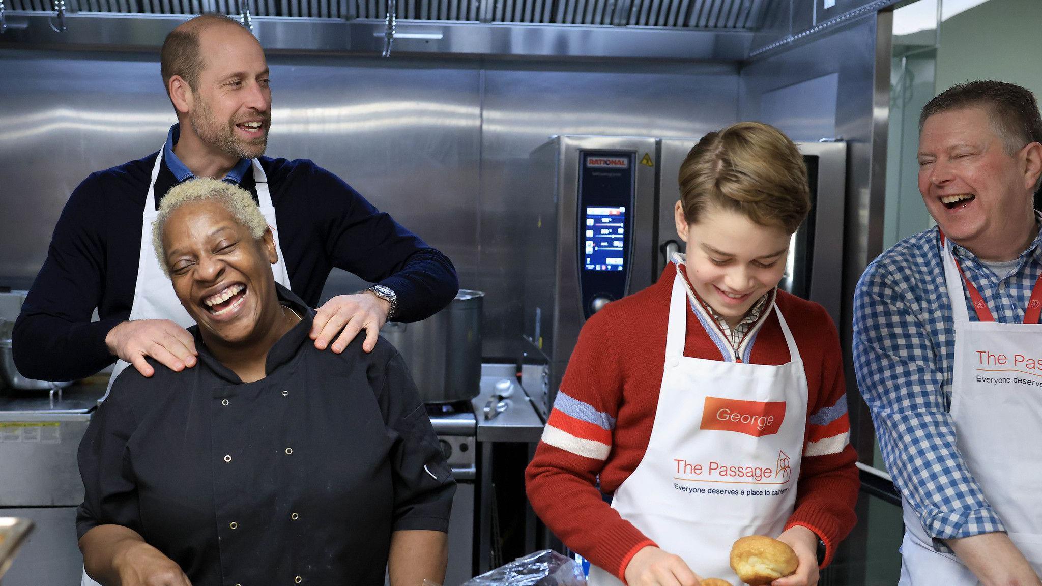 George joins Prince William in preparing meal for homeless - BBC News