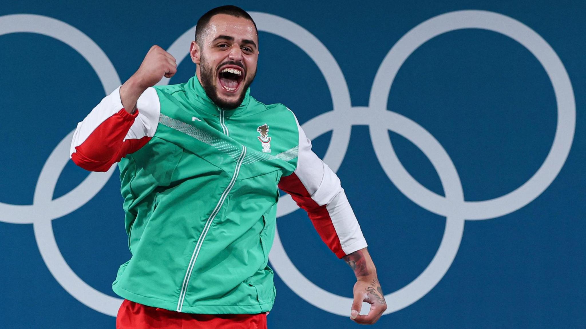 Olympics 2024: Karlos Nasar wins weightlifting gold - BBC Sport