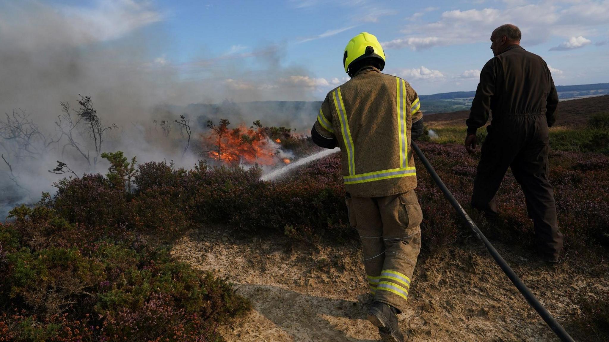 Footpaths reopen after North York Moors wildfire - BBC News