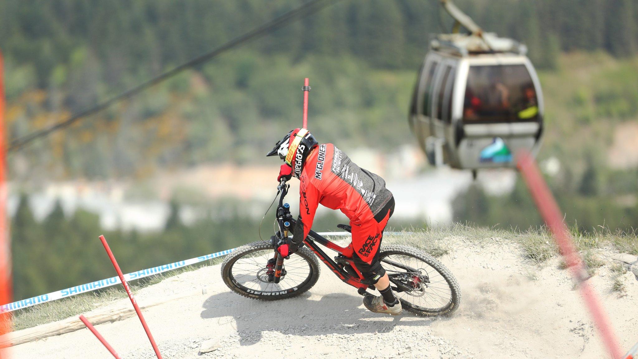 Salisbury-born downhill rider wins Fort William title - BBC News