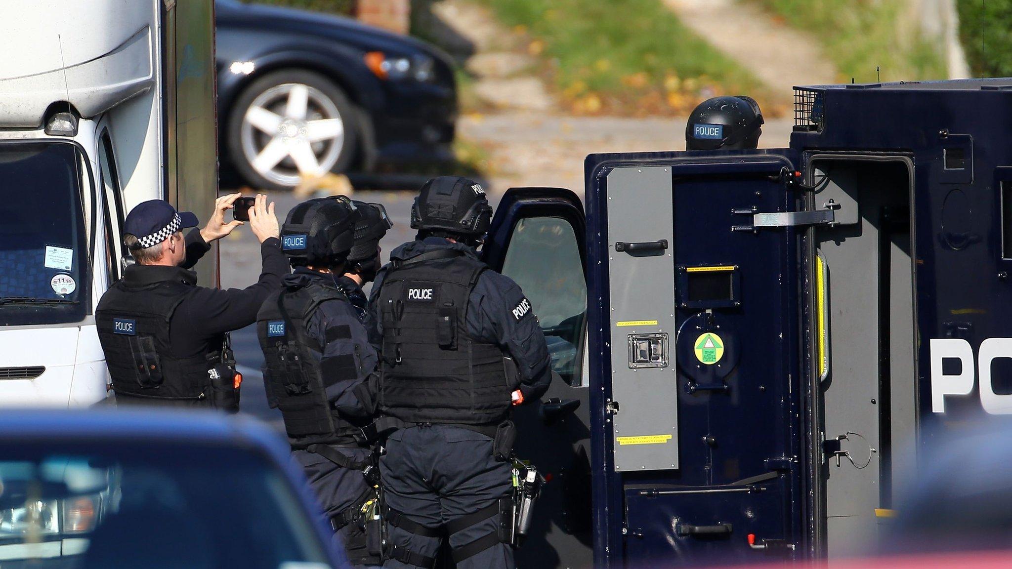 Northolt armed stand-off ends as police enter house - BBC News