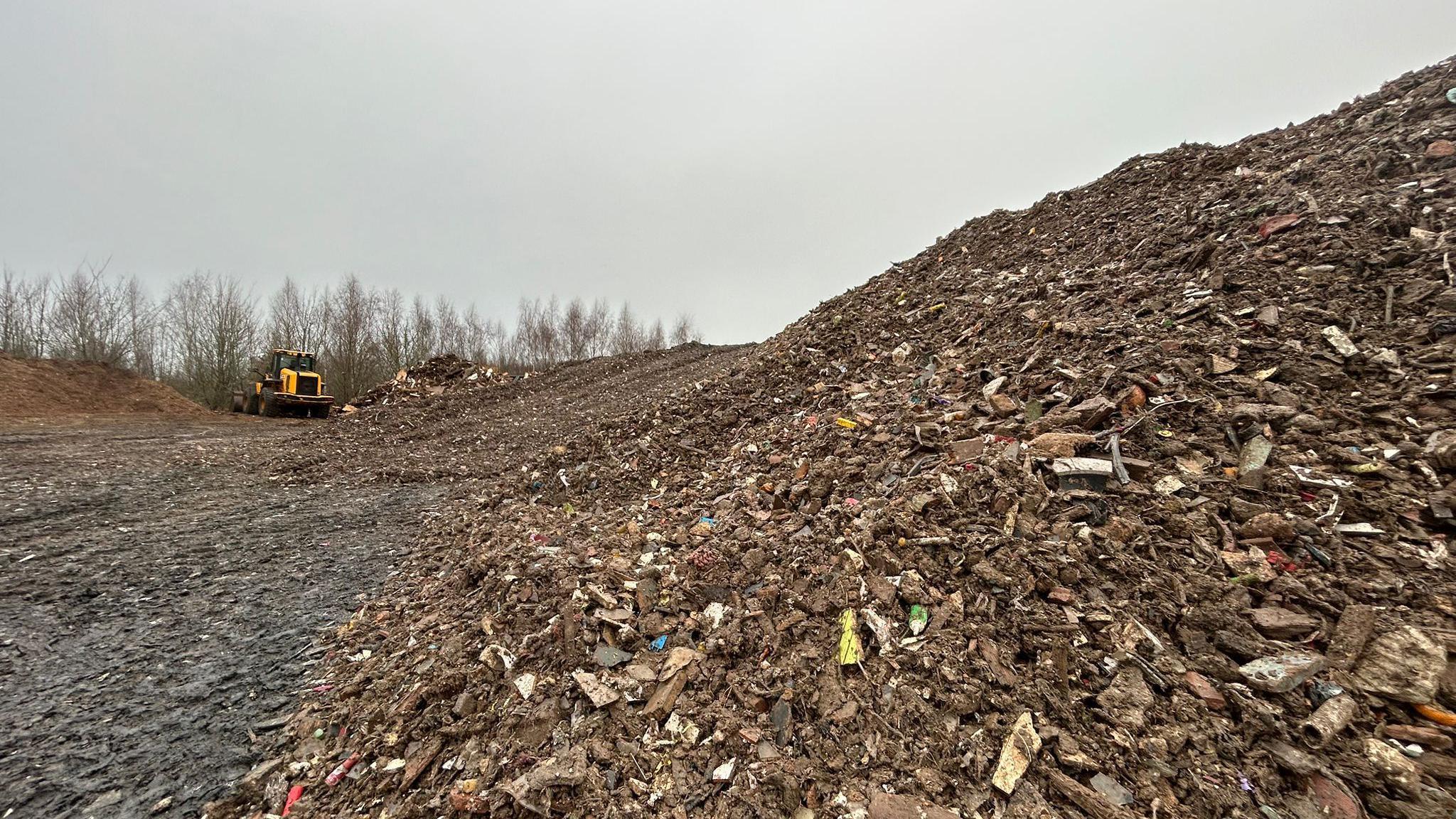 Action taken over dumped waste at Worcester recycling site - BBC News