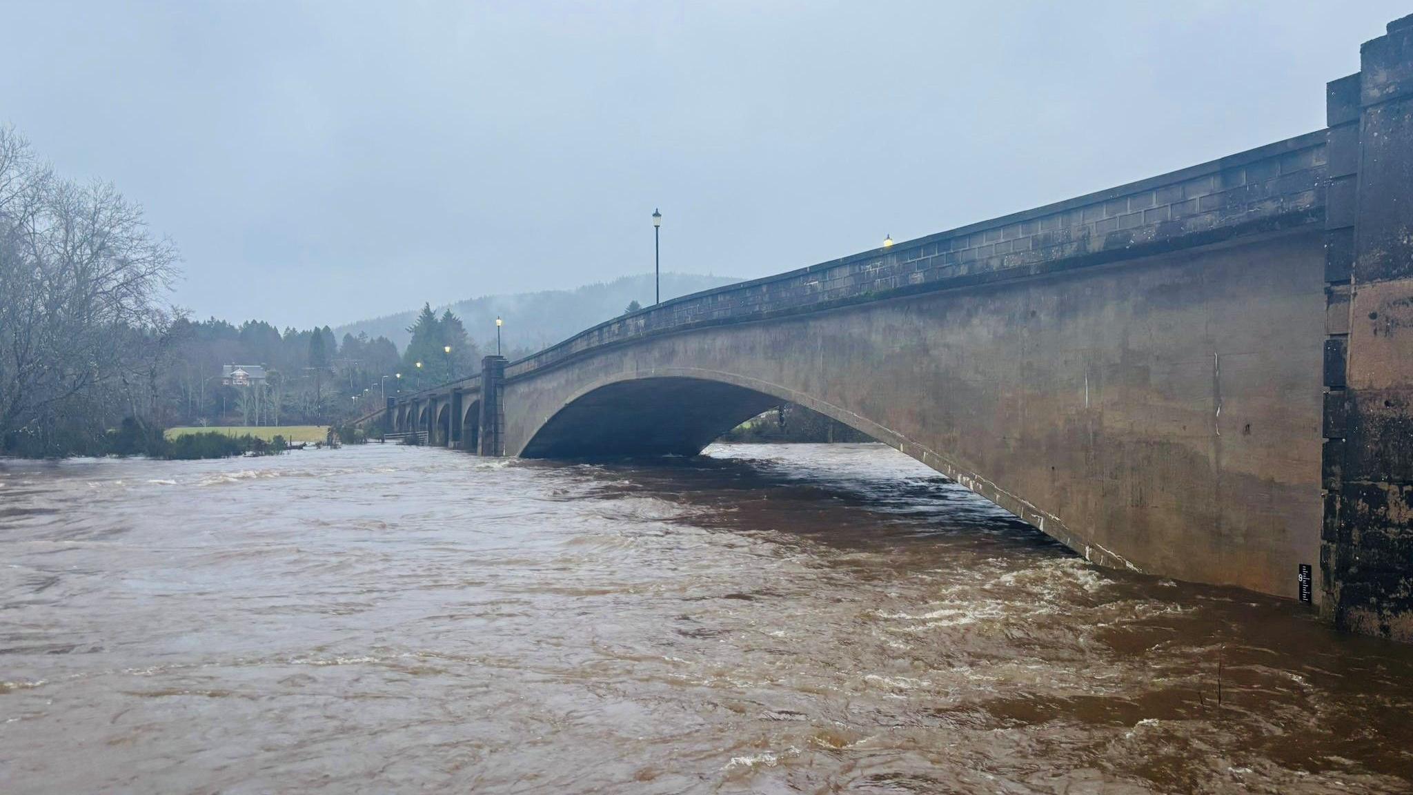 Heavy rain and wind warning as schools closed and roads flooded - BBC News