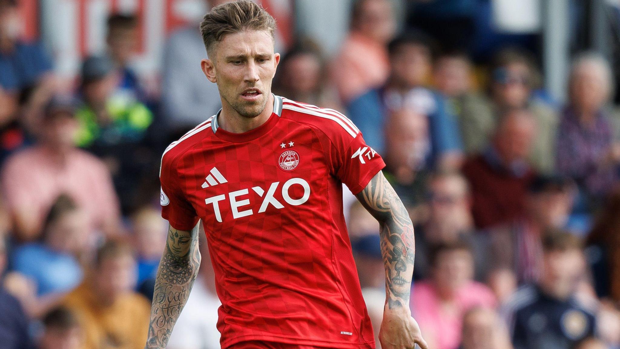 Angus MacDonald departs Aberdeen in search of game time - BBC Sport