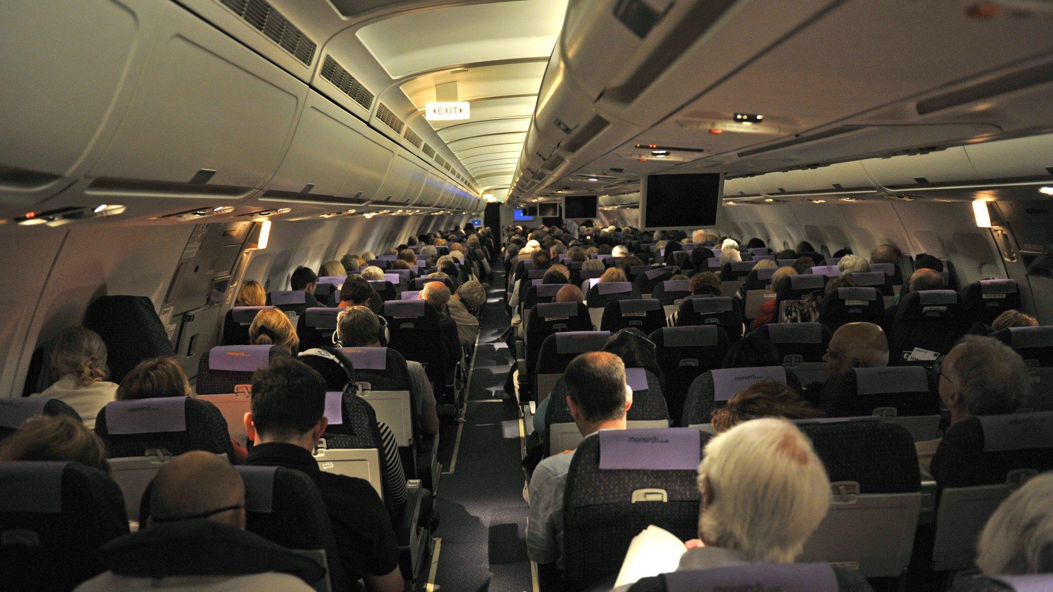 Monarch airline passengers back in Birmingham after delay - BBC News