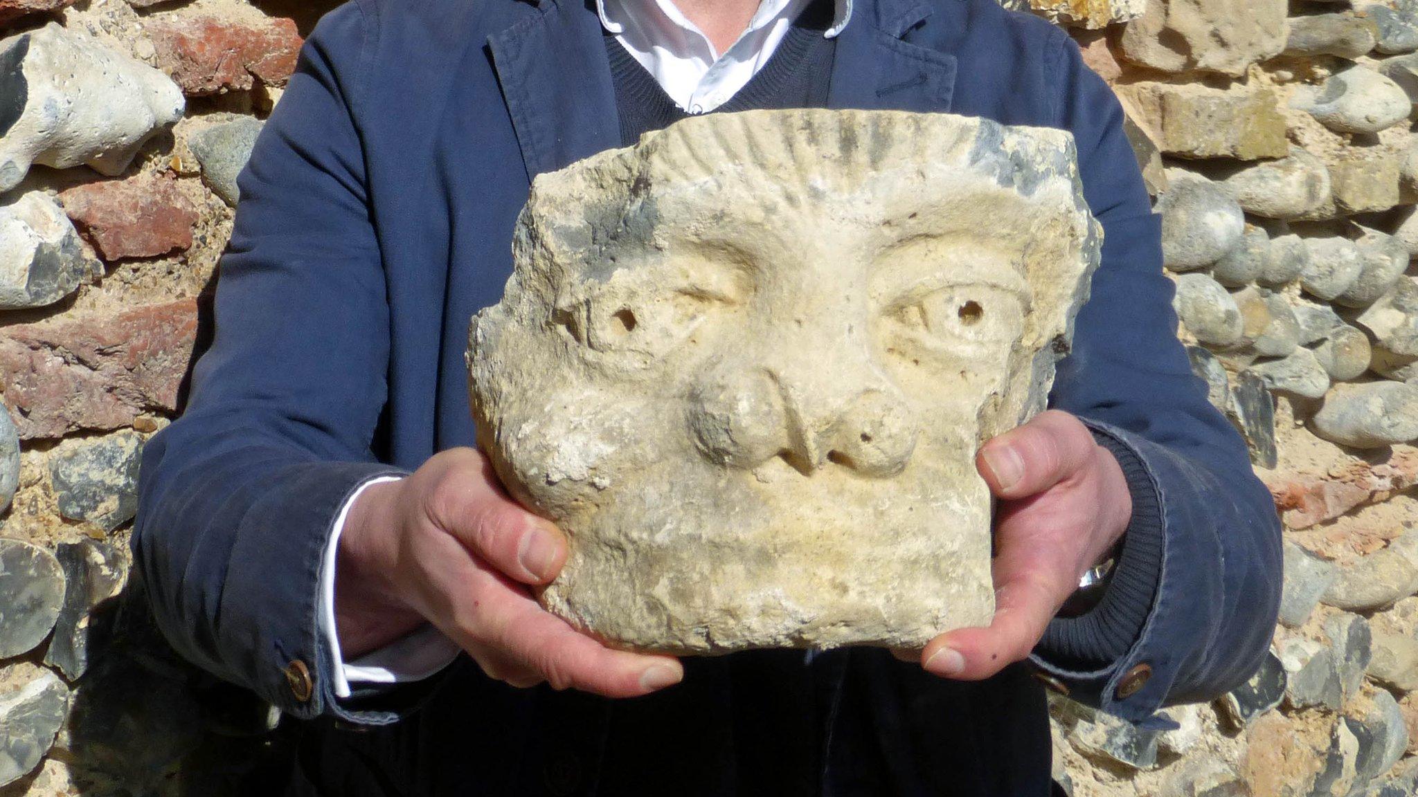 'Yoda' stone head found at Hopton church, Norfolk - BBC News