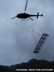 Helicopter airlifts bridge to Torridon mountain path - BBC News