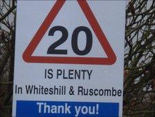 Gloucestershire villagers told to pull down 20mph signs - BBC News