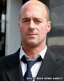 Hector Christie fined for destroying GM crops in protest - BBC News