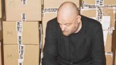 The firm selling raincoats with added Swedish melancholy - BBC News