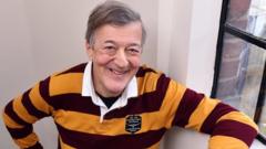 Stephen Fry back at work three months after fall off stage - BBC News