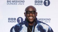 Dide: Who is the masked Premier League rapper? - BBC News