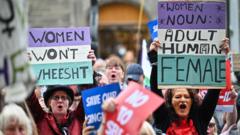 Supreme Court judges consider ruling on definition of a woman - BBC News