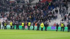 Pitch invasions: Concerns raised over player safety - BBC Newsround
