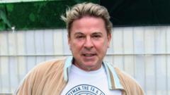 Dollar singer David Van Day wins Thurrock by-election - BBC News