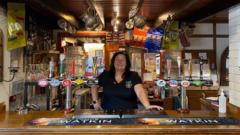 Cost of living: Pub halves beer and cider choice to survive - BBC News