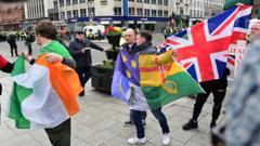 Anti-immigration protest and counter rally gather at Belfast City Hall ...