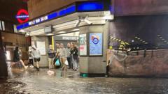 Flooding in London: Heavy rain causes travel disruption - BBC News