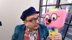 Timmy Mallett: TV presenter cycles around NI's 'hidden gems' - BBC News
