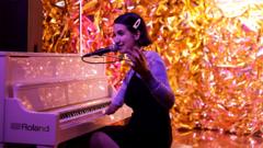 CMAT: Irish singer fractured her neck 'rocking out on stage' - BBC News