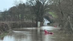 Somerset roads and and businesses impacted by heavy rain - BBC News