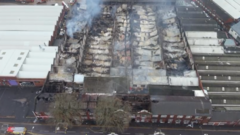 Firefighters remain at site of Wolverhampton factory fire - BBC News